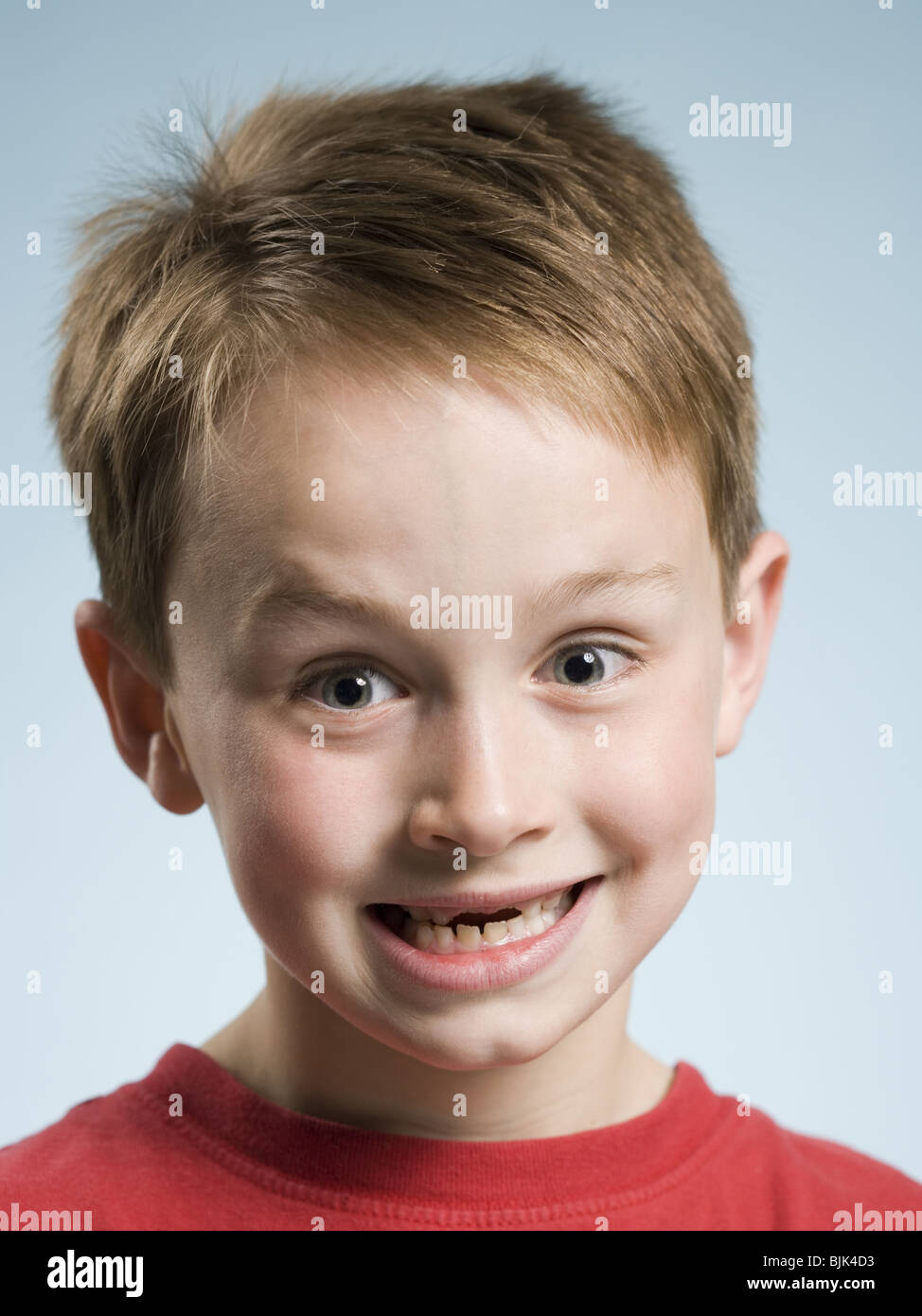 Close-up of boy smiling with missing front teeth Stock Photo - Alamy