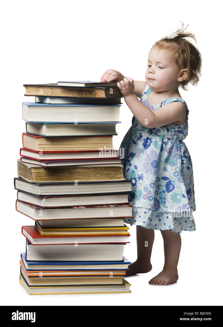 Young girl standing beside Cut Out Stock Images & Pictures - Alamy