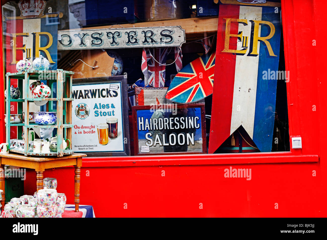 A colorful or colorful antique or junk shop in Portobello Road, London ...
