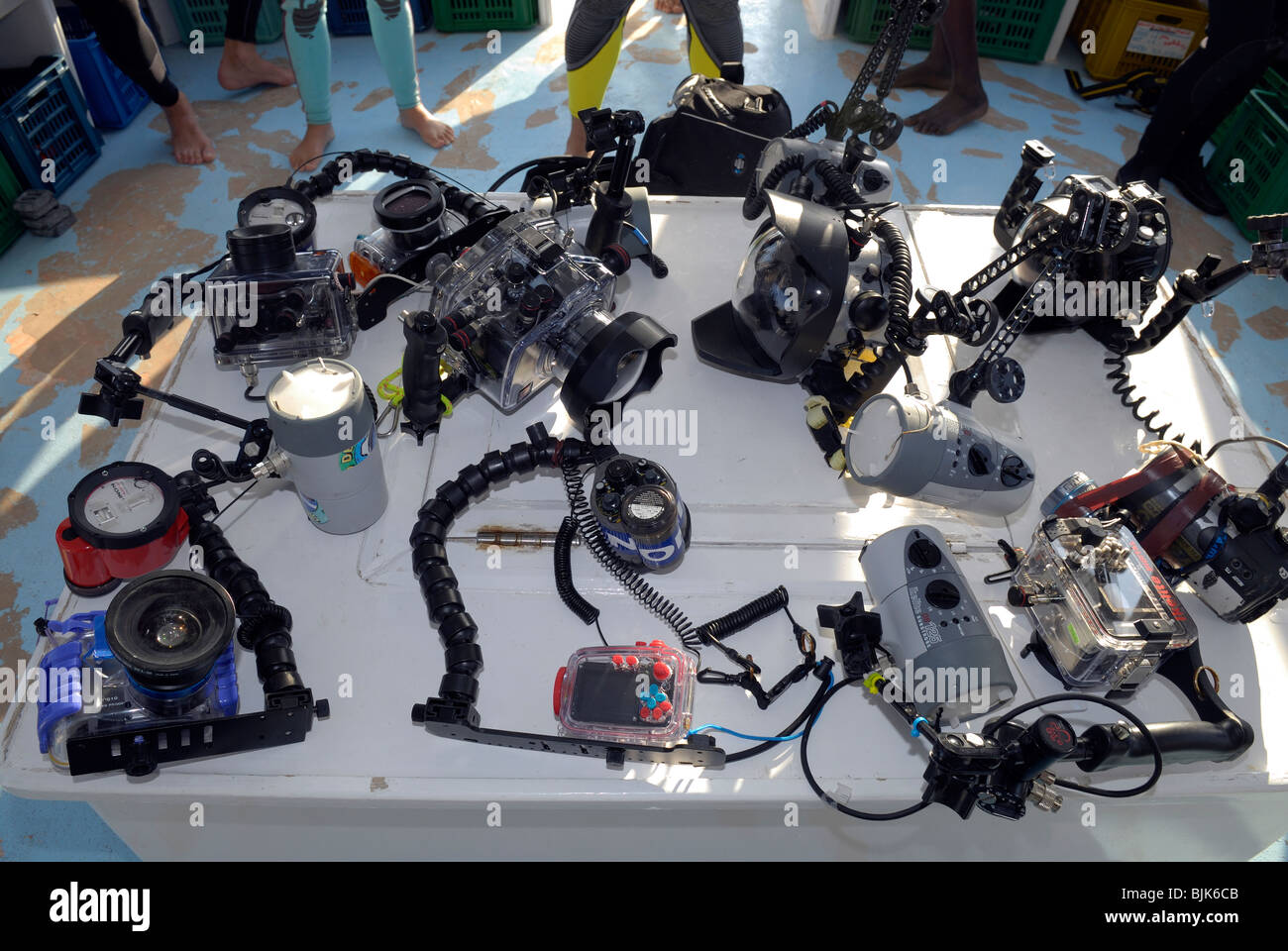 Set of digital cameras, housings and strobes on a deck of a boat Stock ...