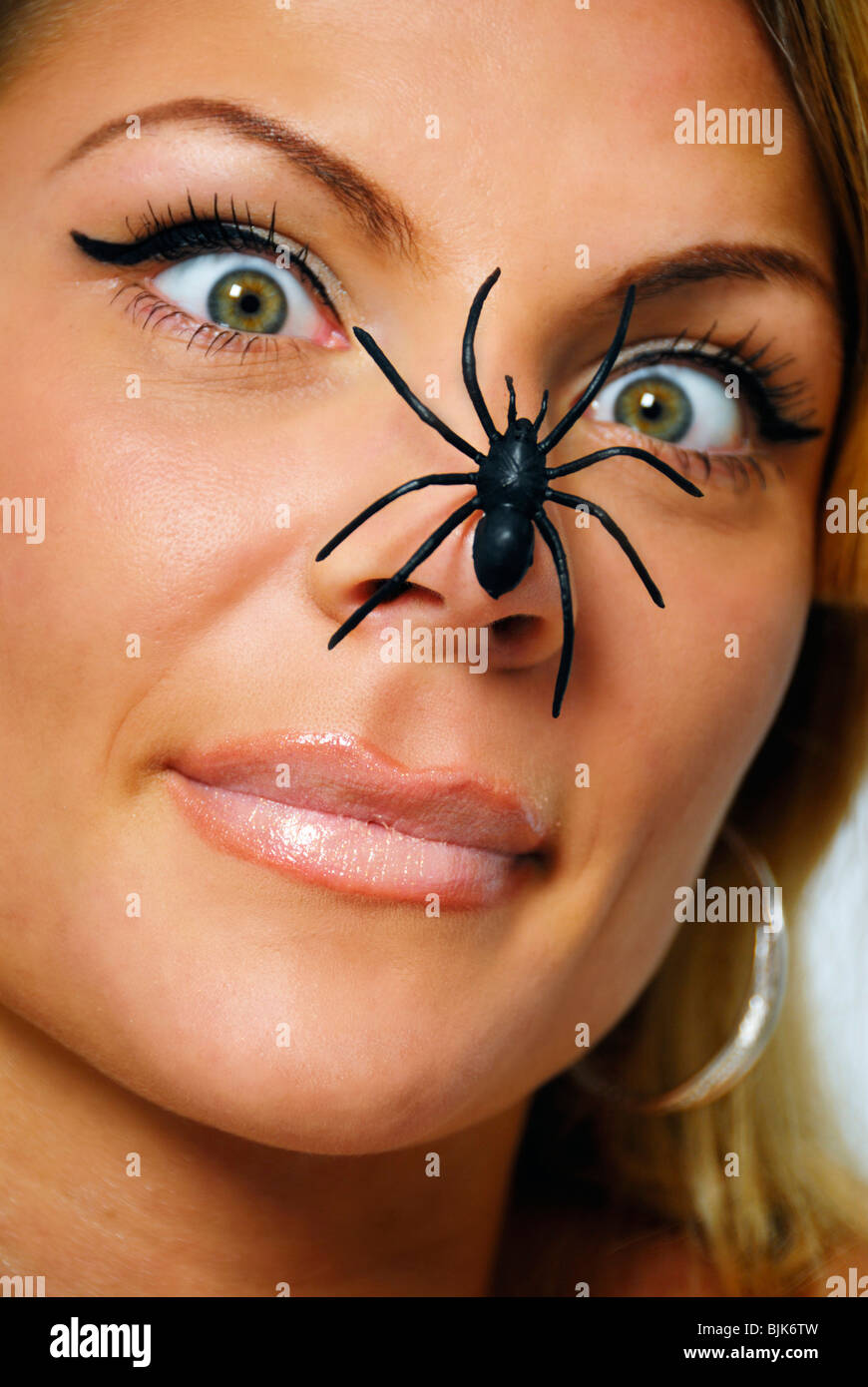 Woman scared spider hi-res stock photography and images - Alamy