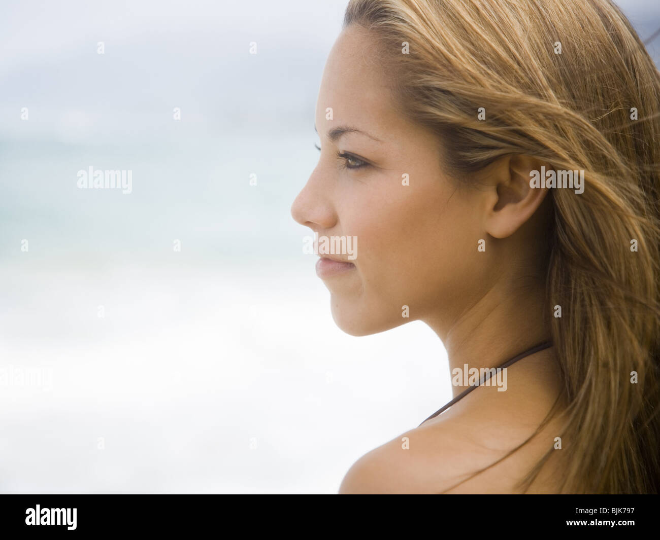 Profile of woman outdoors Stock Photo - Alamy