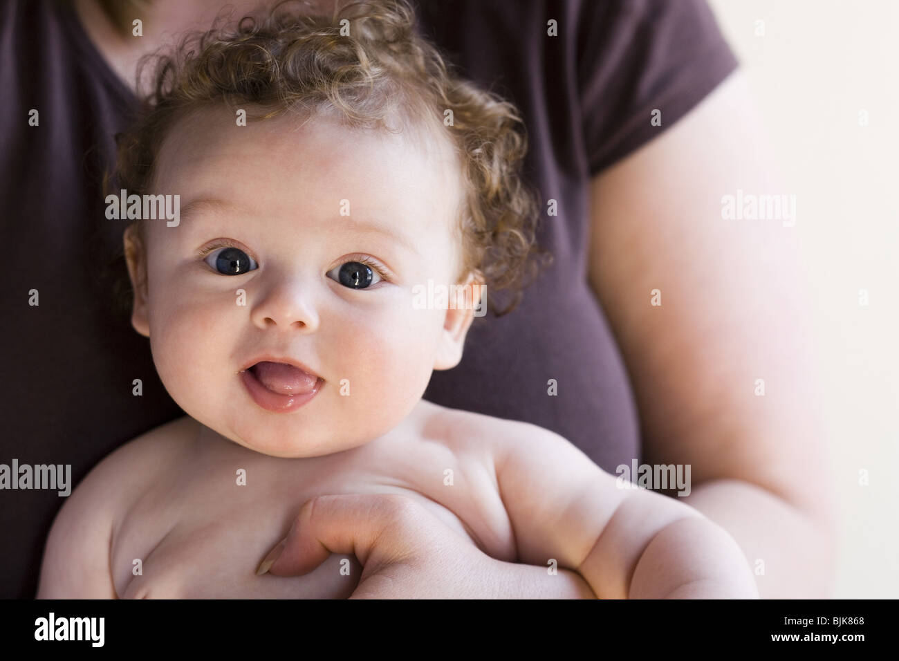 Close-up of baby smiling Stock Photo - Alamy