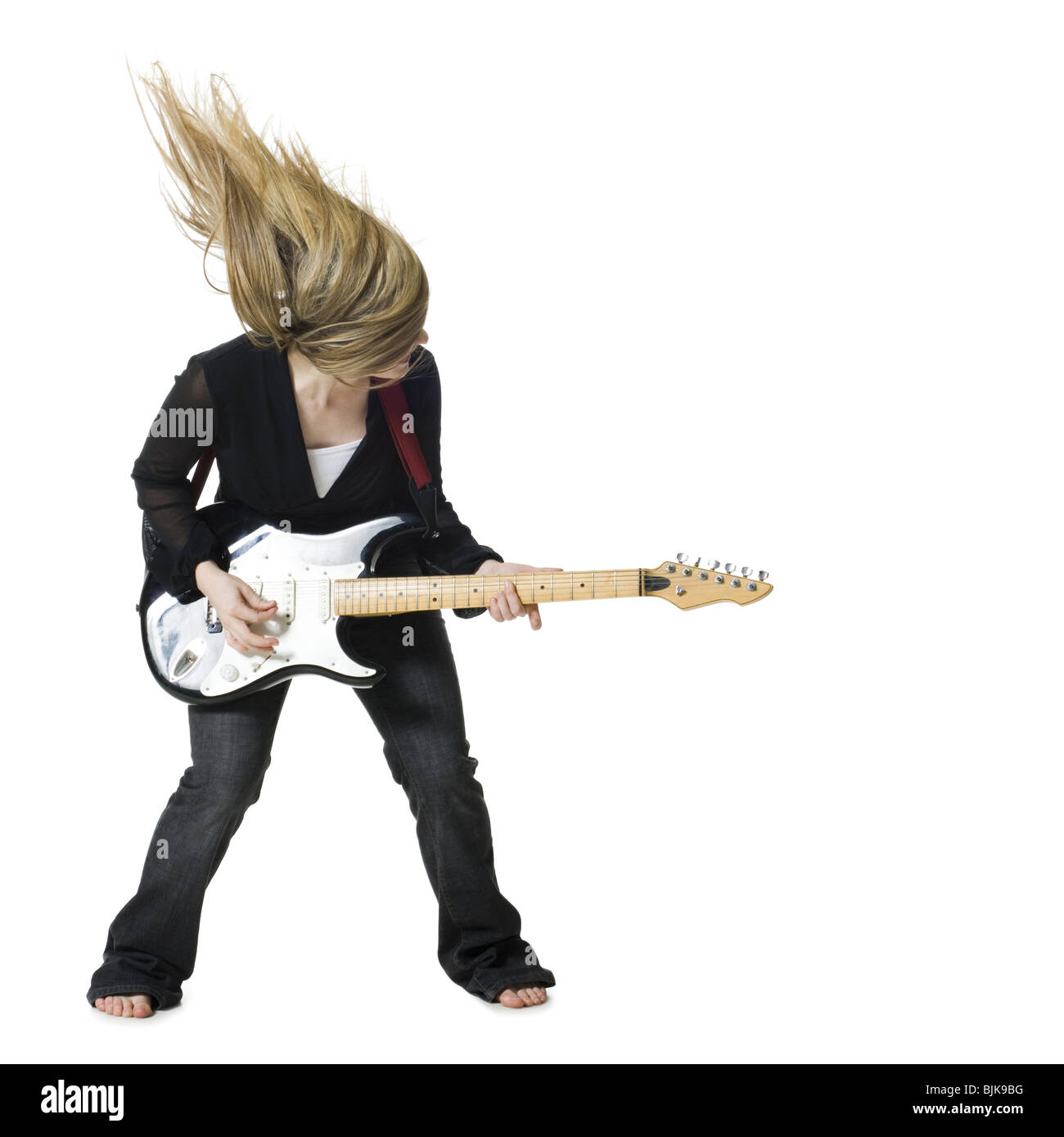 Woman playing electric guitar Stock Photo - Alamy