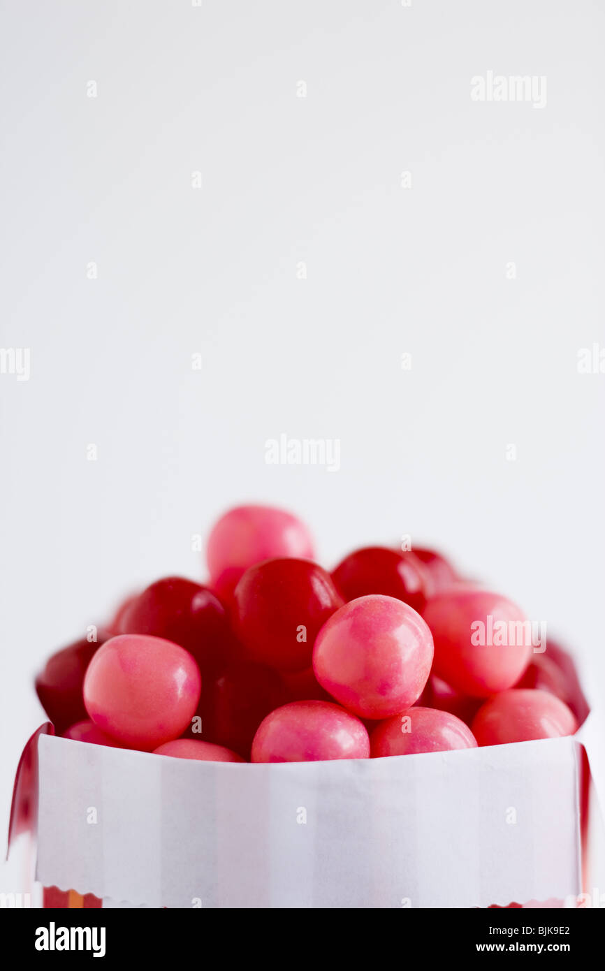 Candy box with pink and red candies Stock Photo - Alamy