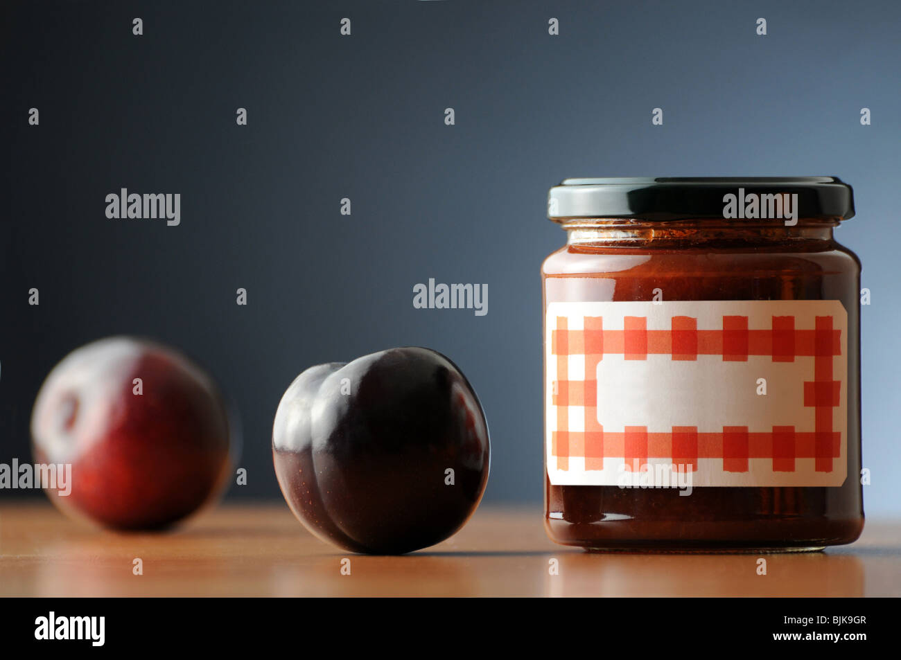 plum jam in a labelled and not branded can Stock Photo - Alamy