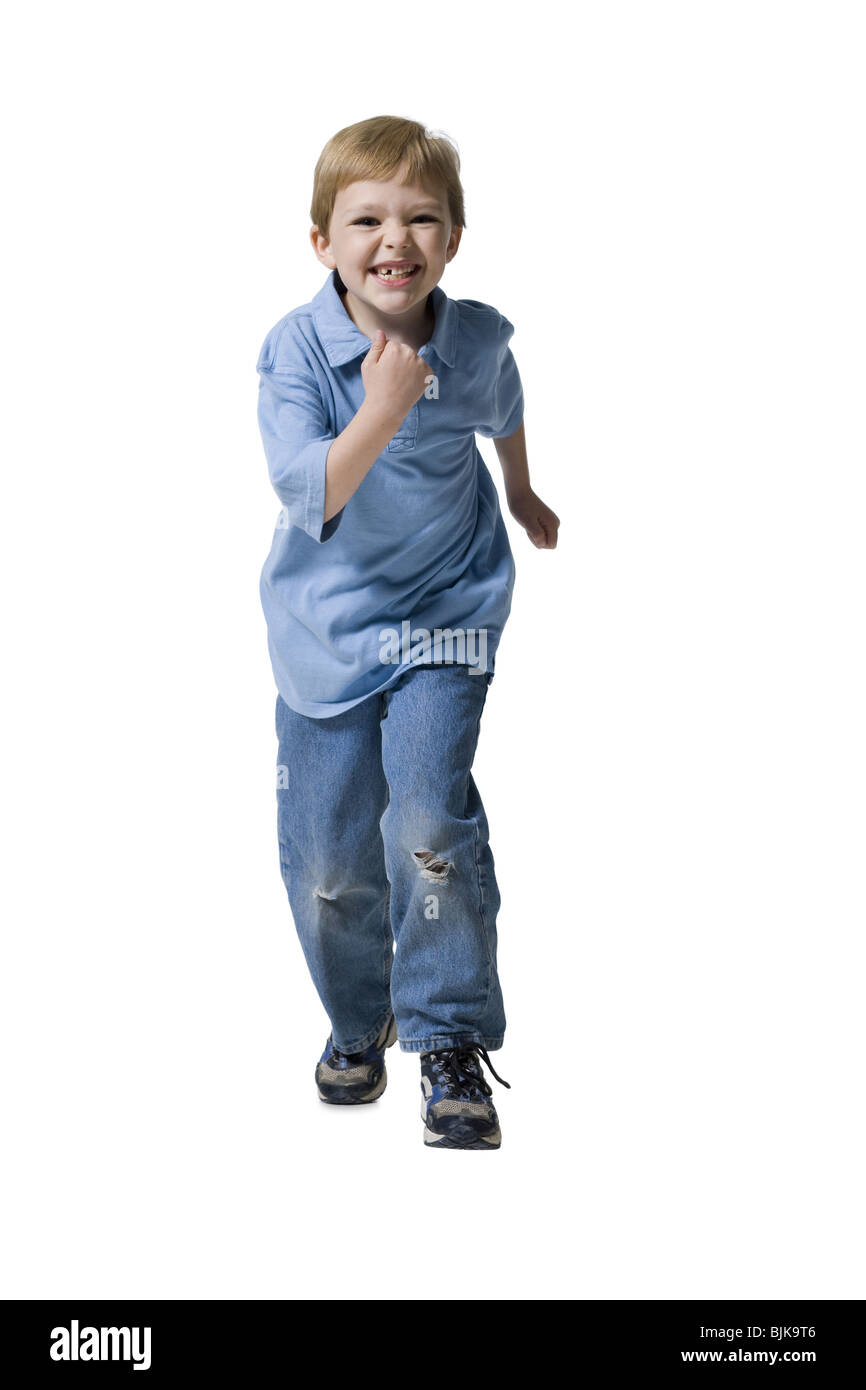 Boys running to camera Cut Out Stock Images & Pictures - Alamy