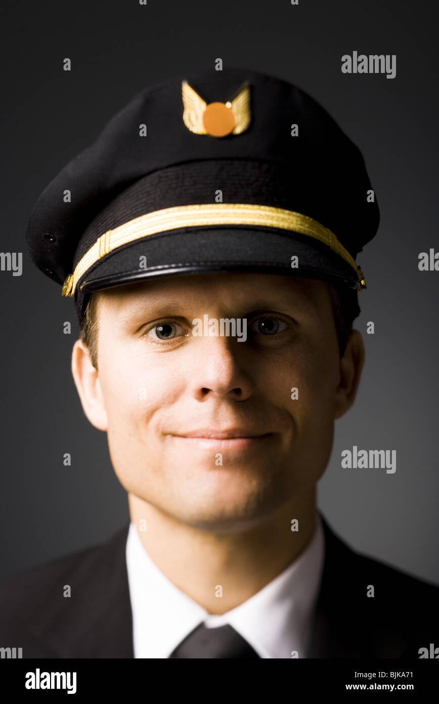 Portrait of a pilot smiling Stock Photo - Alamy