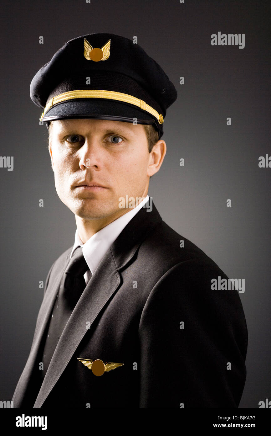 Portrait of a pilot smiling Stock Photo - Alamy