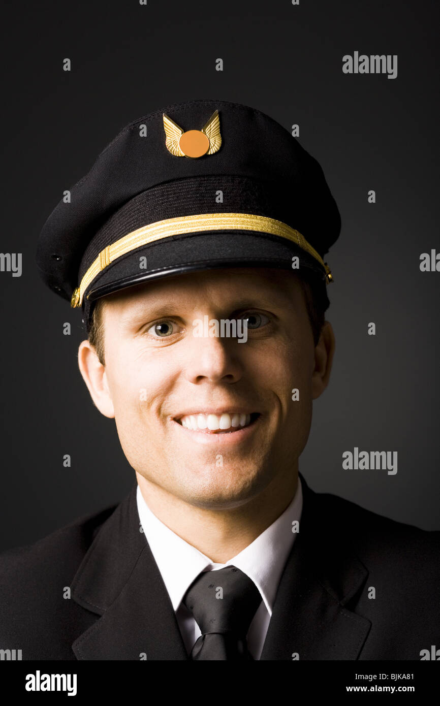 Portrait of a pilot smiling Stock Photo - Alamy