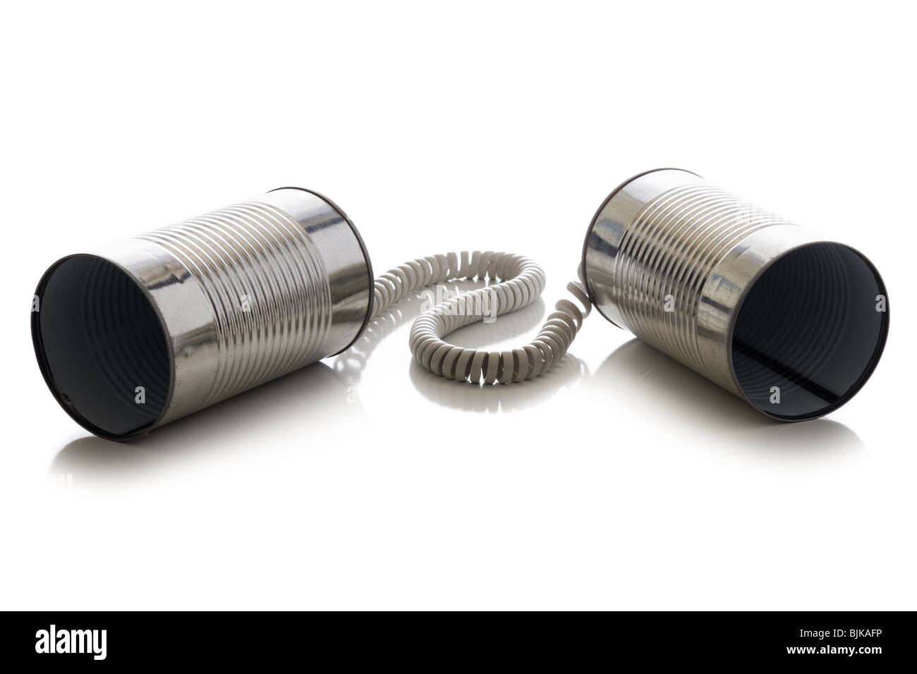 Two cans attached with telephone cord Stock Photo - Alamy