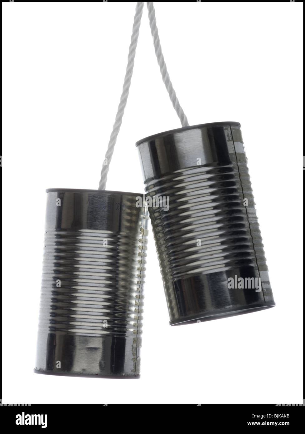 Two cans attached with rope Stock Photo - Alamy
