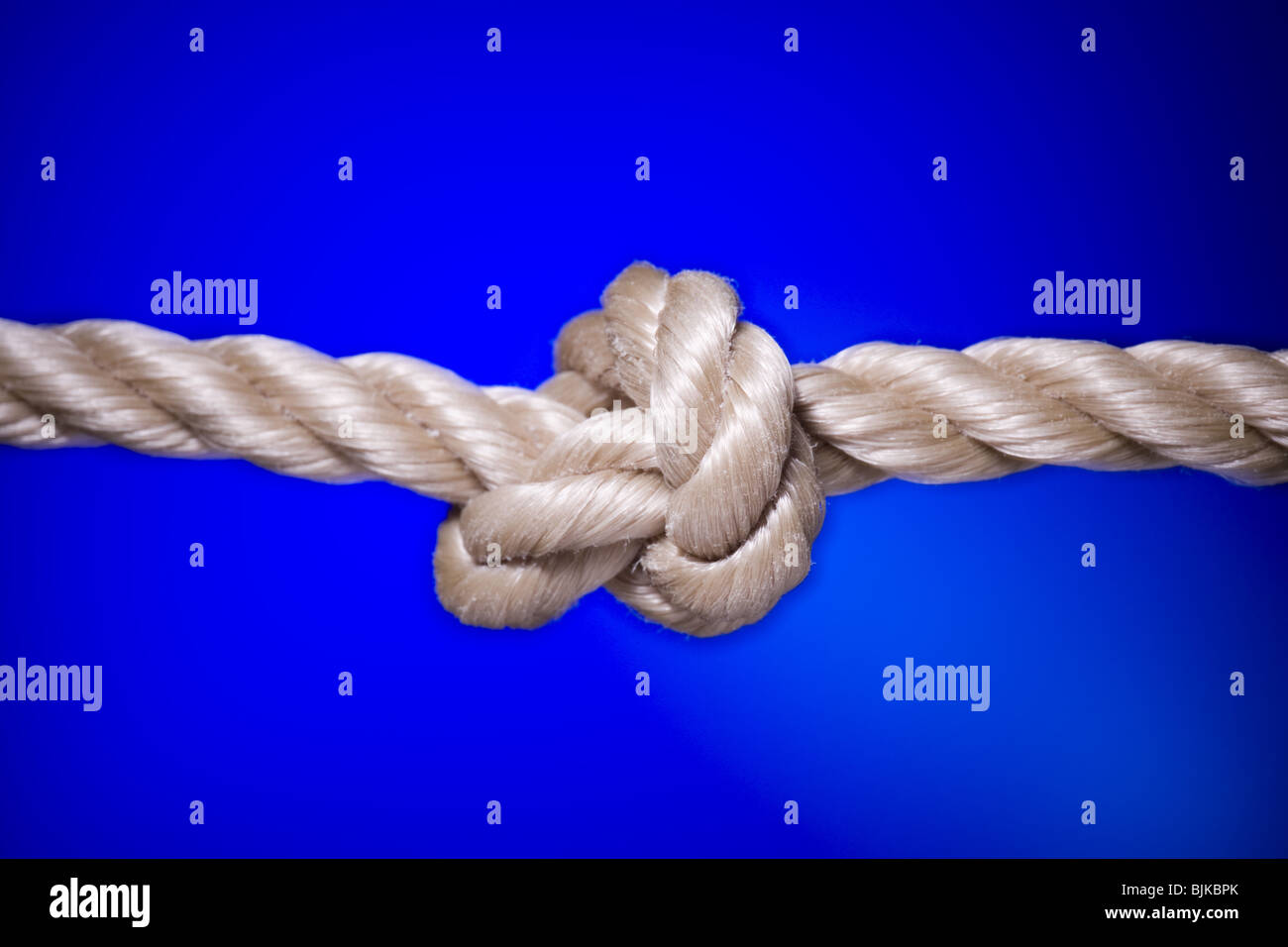 Rope with knot Stock Photo - Alamy