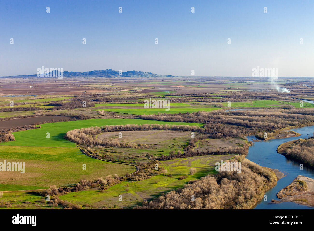 Aerial view of the Sacramento River and the Sutter Buttes in the ...