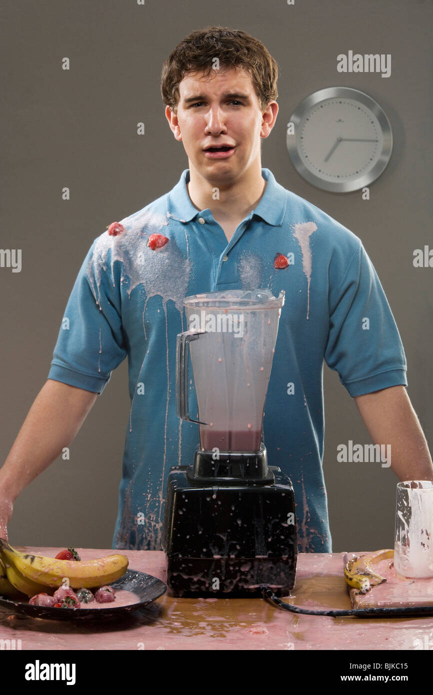 Man with blender mishap Stock Photo - Alamy