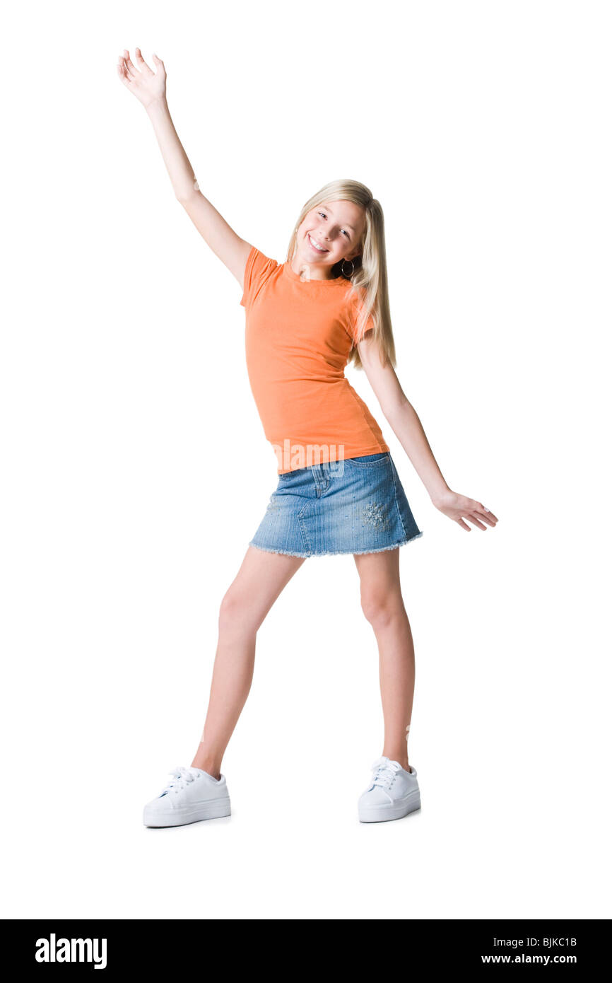 Girl with arms up smiling Stock Photo - Alamy