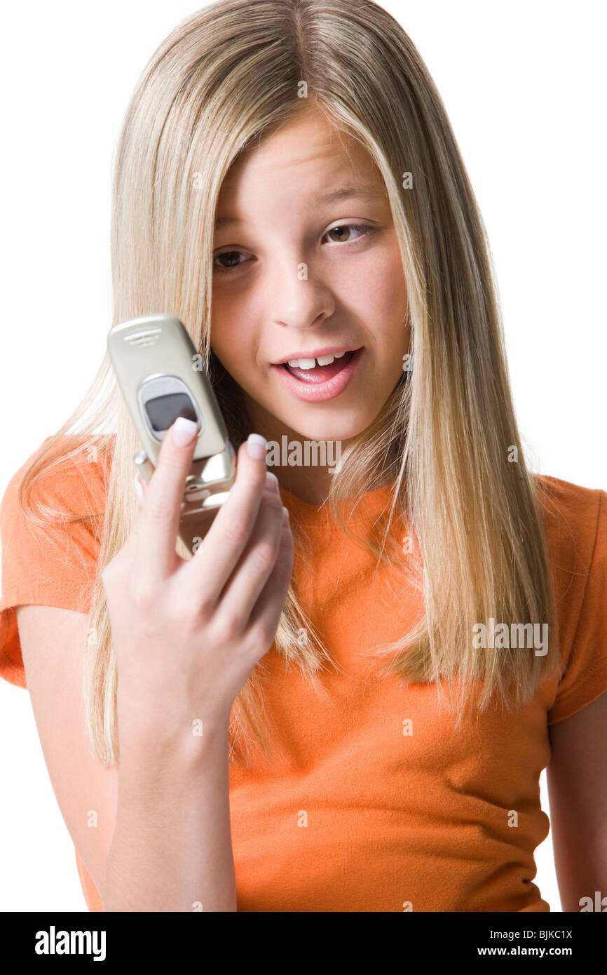 Girl looking at cell phone Stock Photo - Alamy