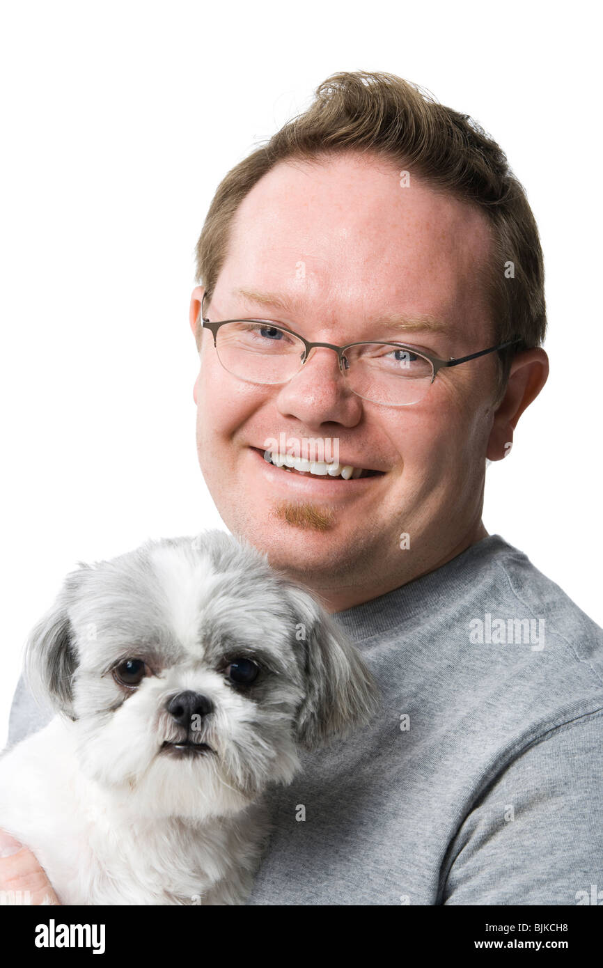 Portrait of a man with small dog Stock Photo - Alamy