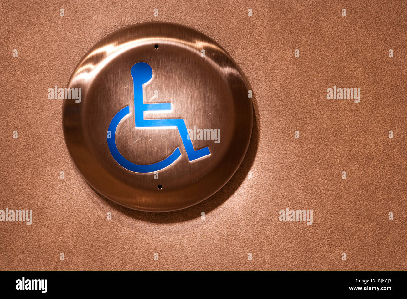 Wheelchair access door button Stock Photo - Alamy