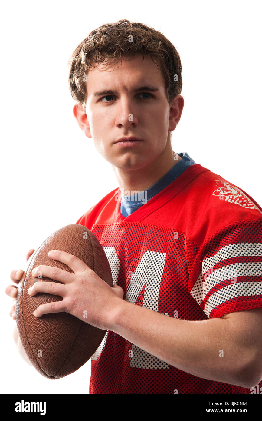 Man standing with football Stock Photo - Alamy