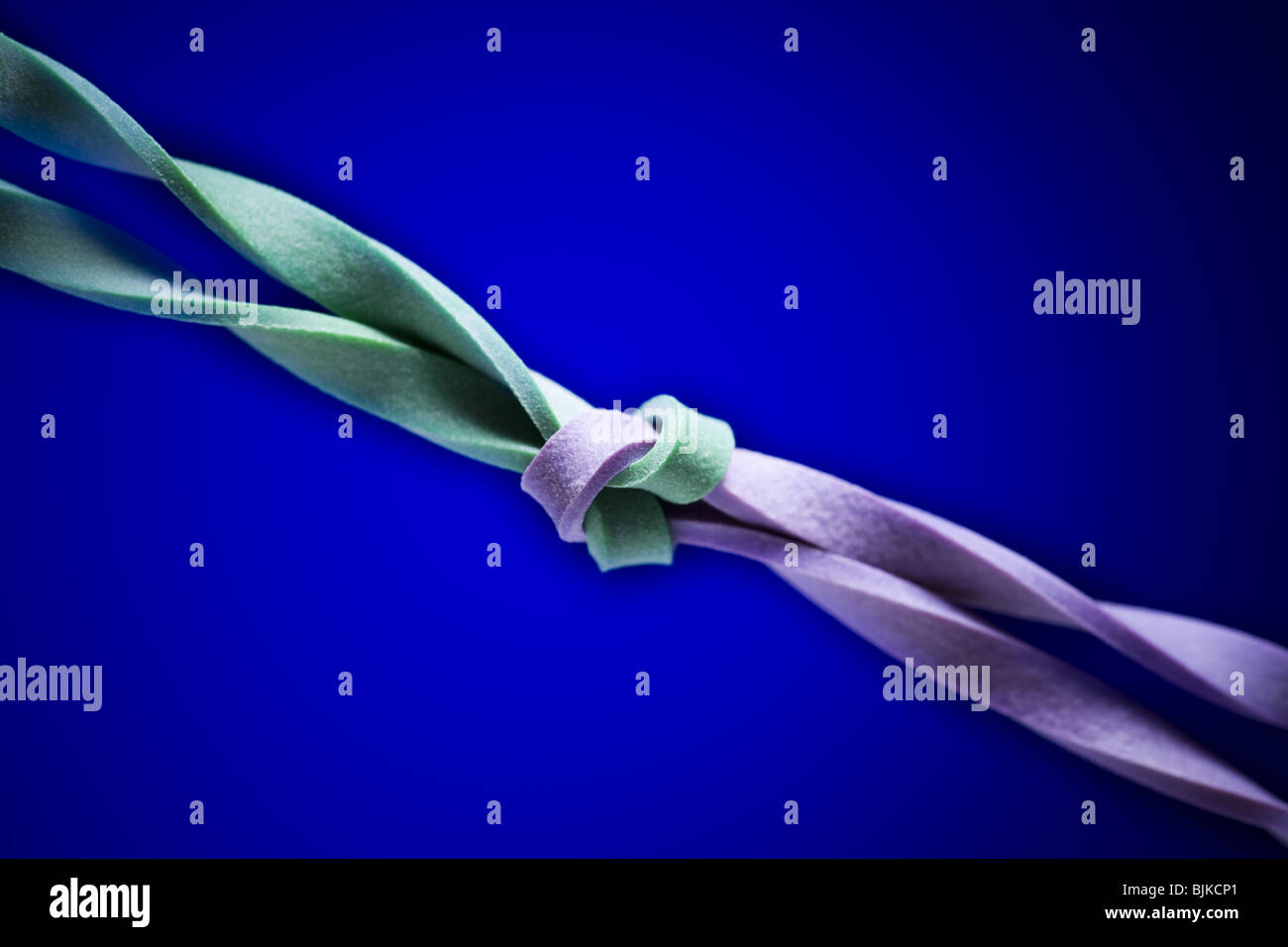 Connected rubber bands hi-res stock photography and images - Alamy