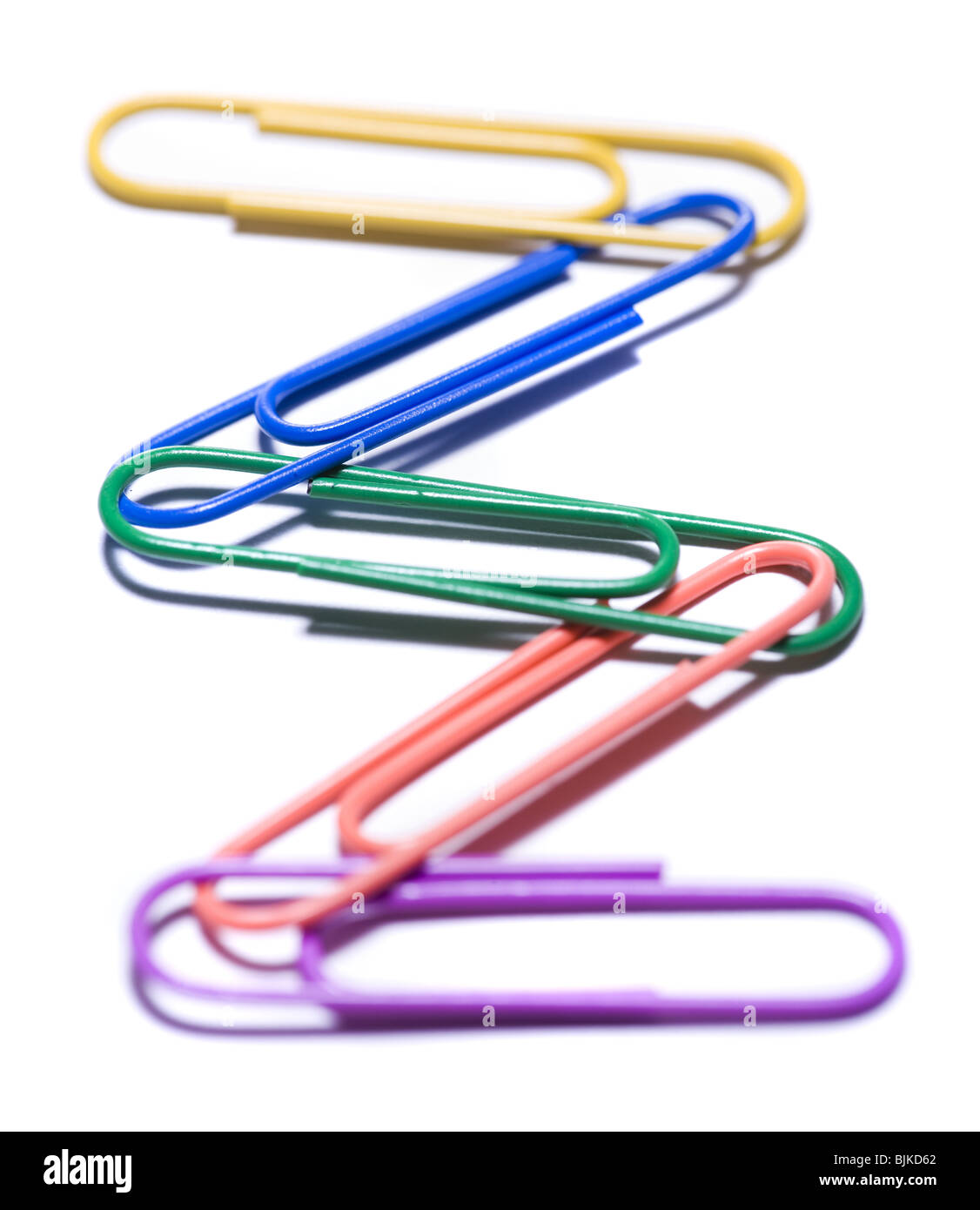 Multi coloured paperclips attached Stock Photo - Alamy