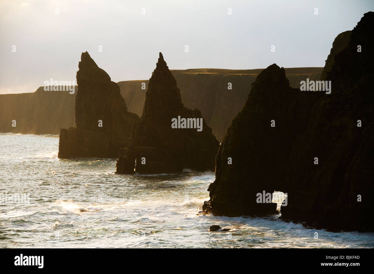 The Stacks of Duncansby and the Thirle Door rock arch, Duncansby Head ...