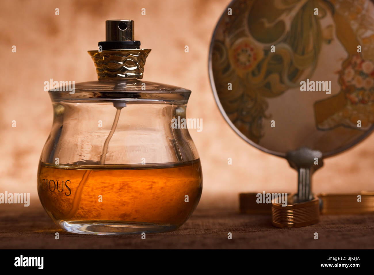 Abstract of a bottle of women's perfume. Backlit Stock Photo - Alamy
