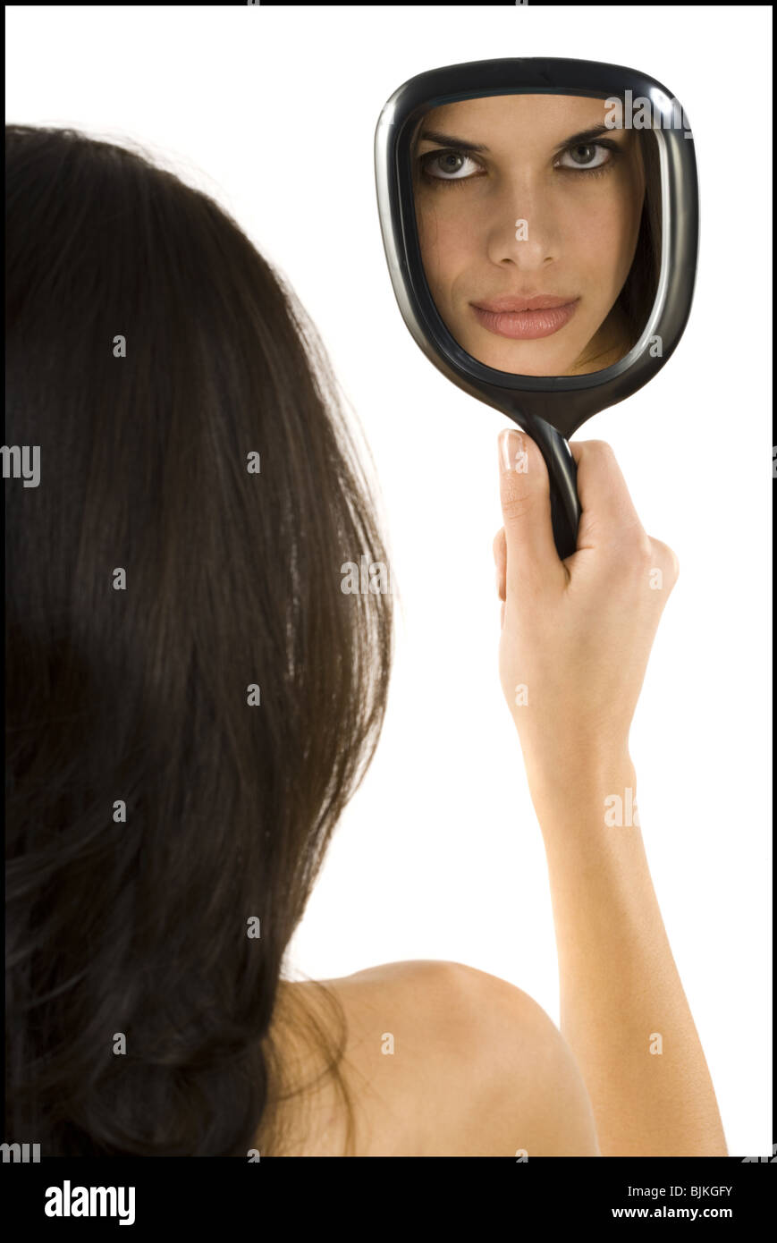 Looking behind head mirror hi-res stock photography and images - Alamy