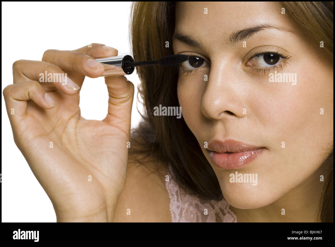 Closeup of woman applying mascara Stock Photo - Alamy