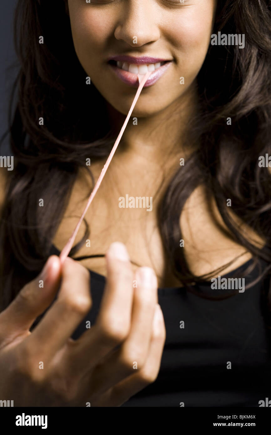 Woman chewing gum hi-res stock photography and images - Alamy