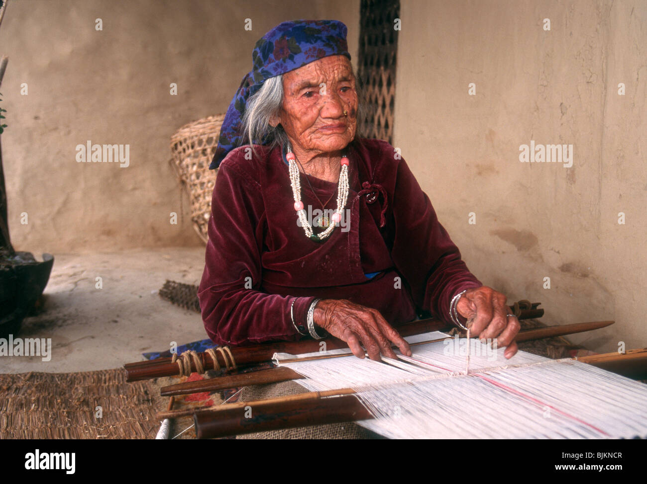 Weaving and spinning cloth. Pokhara. Nepal Stock Photo - Alamy