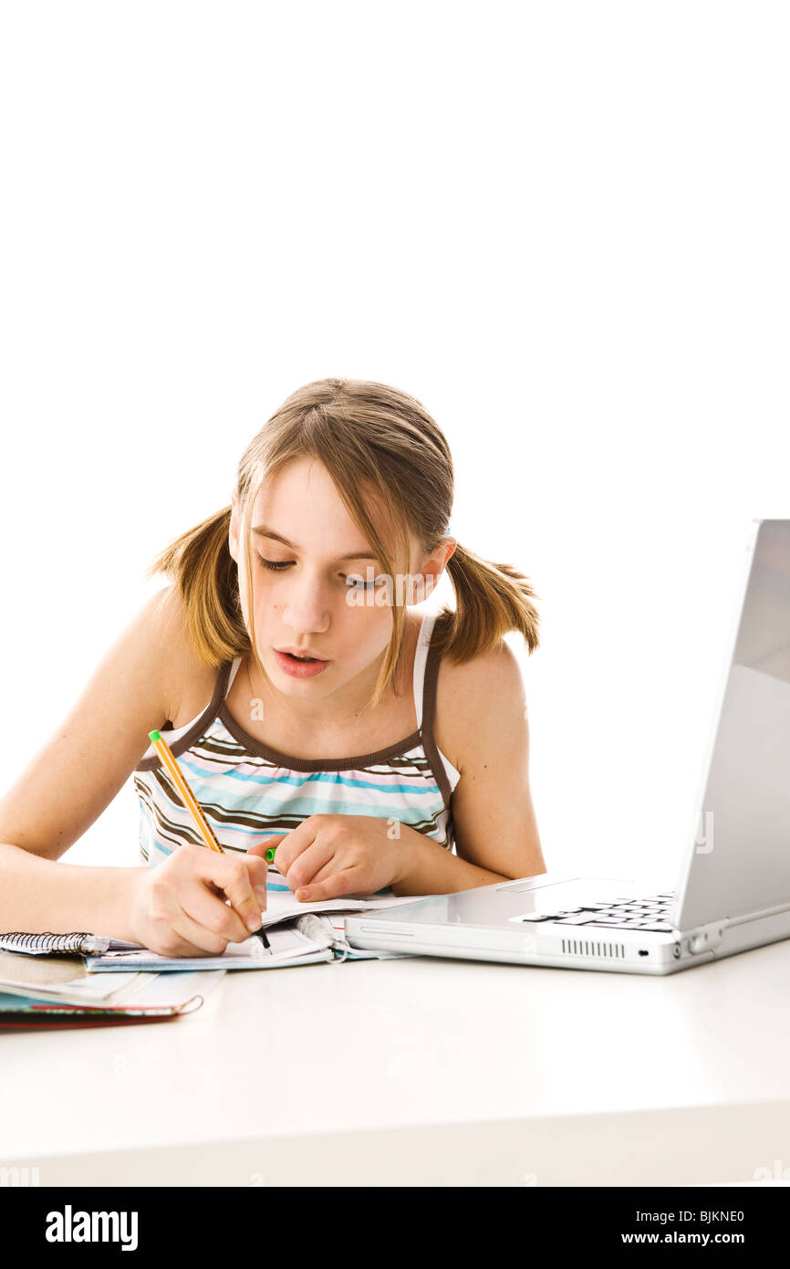 Girl doing homework, learning, computer Stock Photo - Alamy