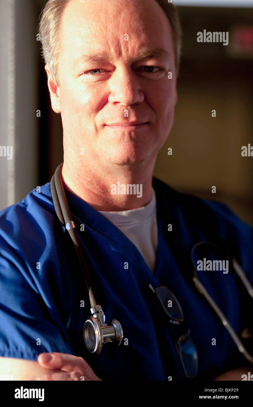 Hospital worker posing Stock Photo - Alamy