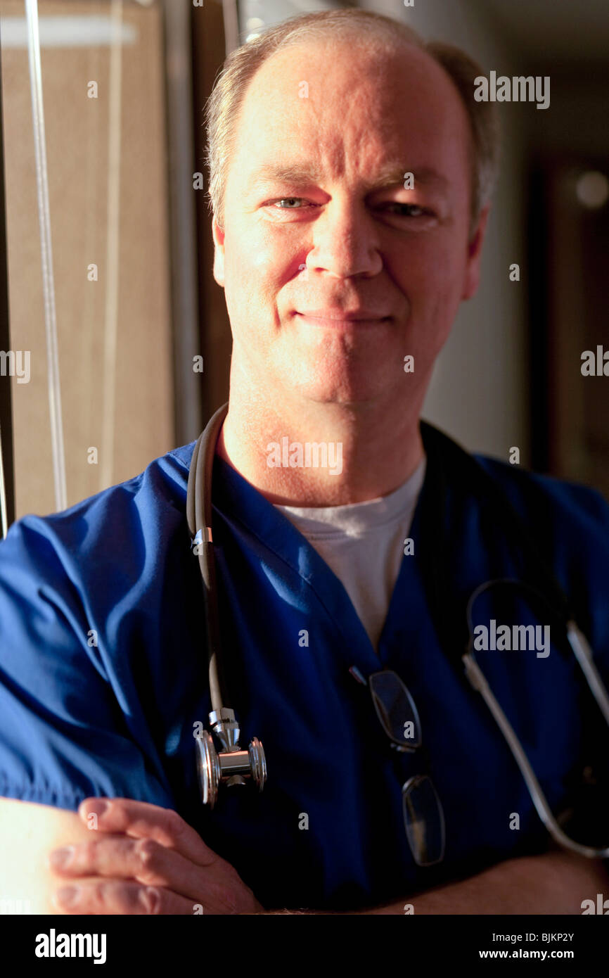 Hospital worker posing Stock Photo - Alamy