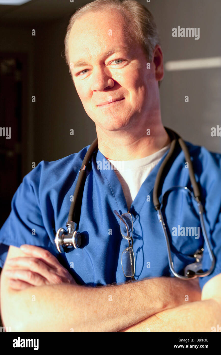Hospital worker posing Stock Photo - Alamy