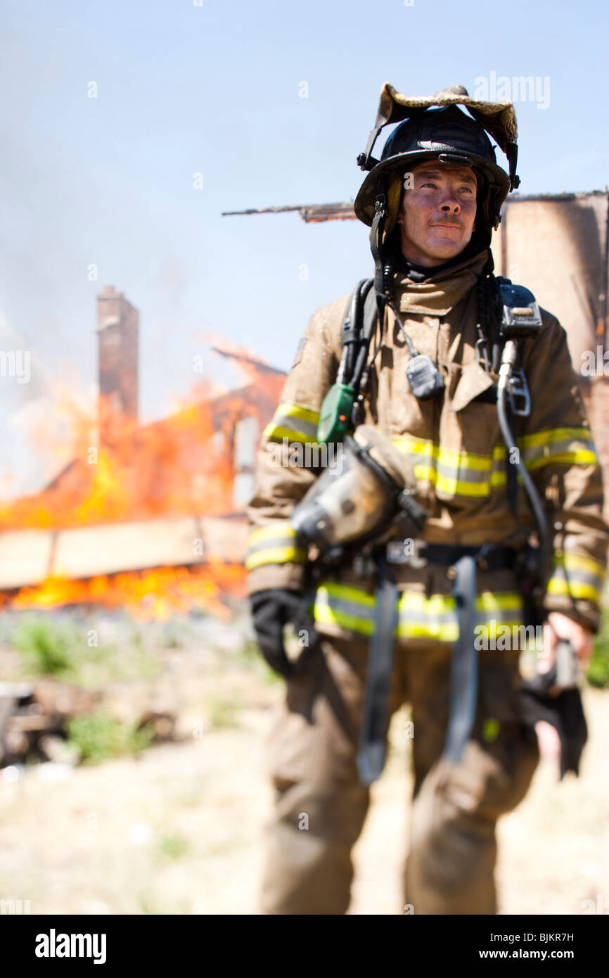 Closeup of fire fighter at work Stock Photo - Alamy