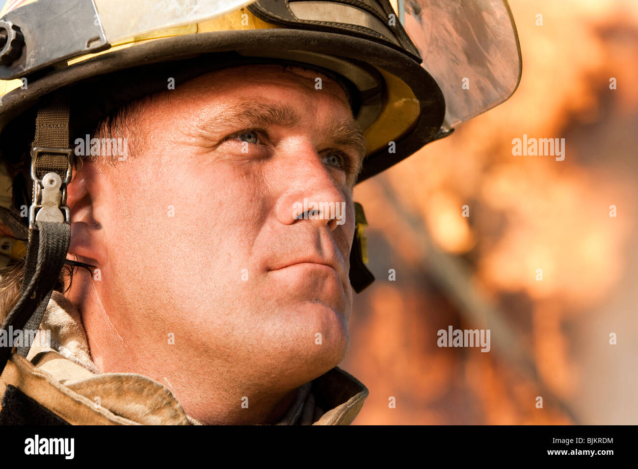 Closeup of fire fighter at work Stock Photo - Alamy