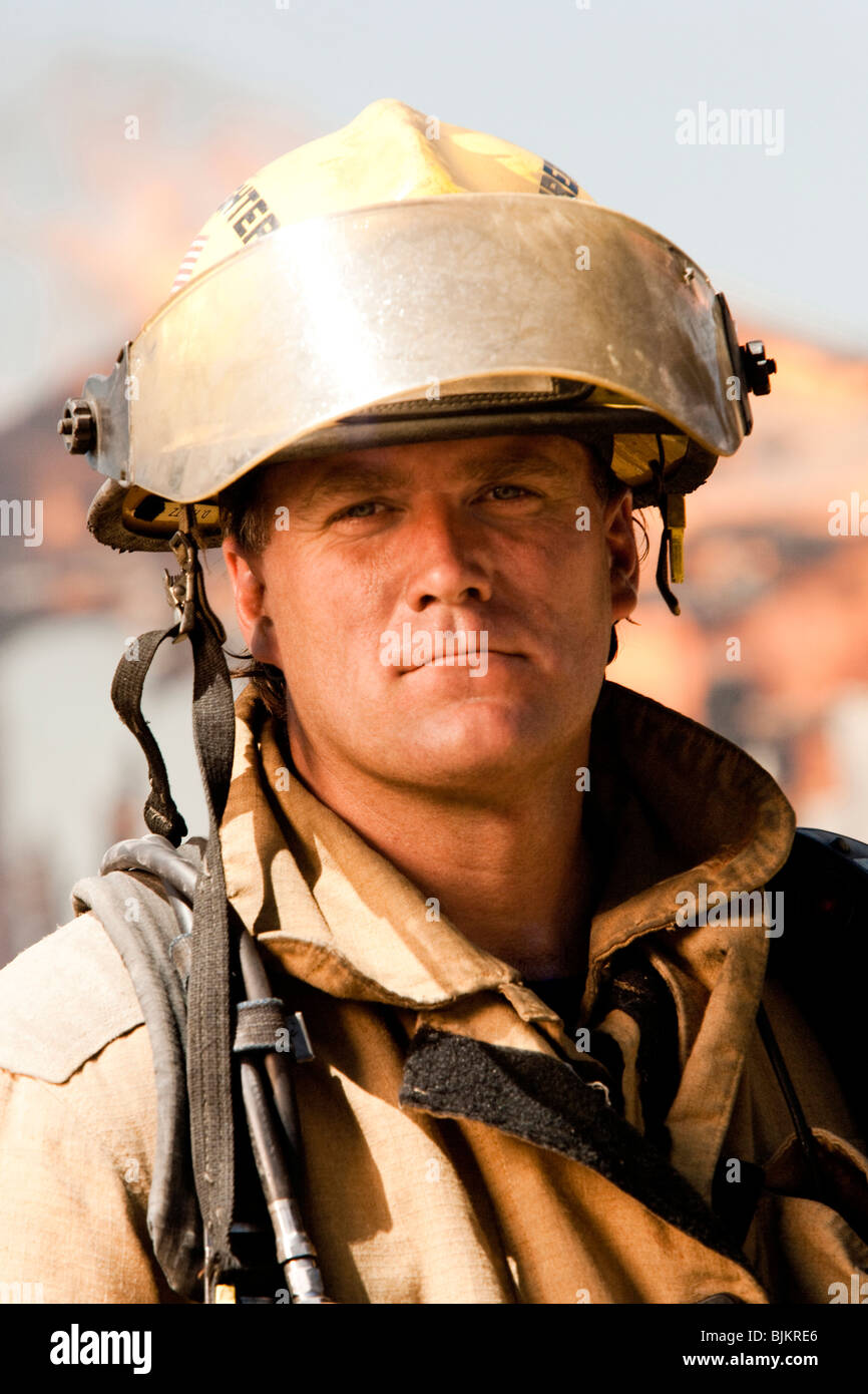Closeup of fire fighter at work Stock Photo - Alamy