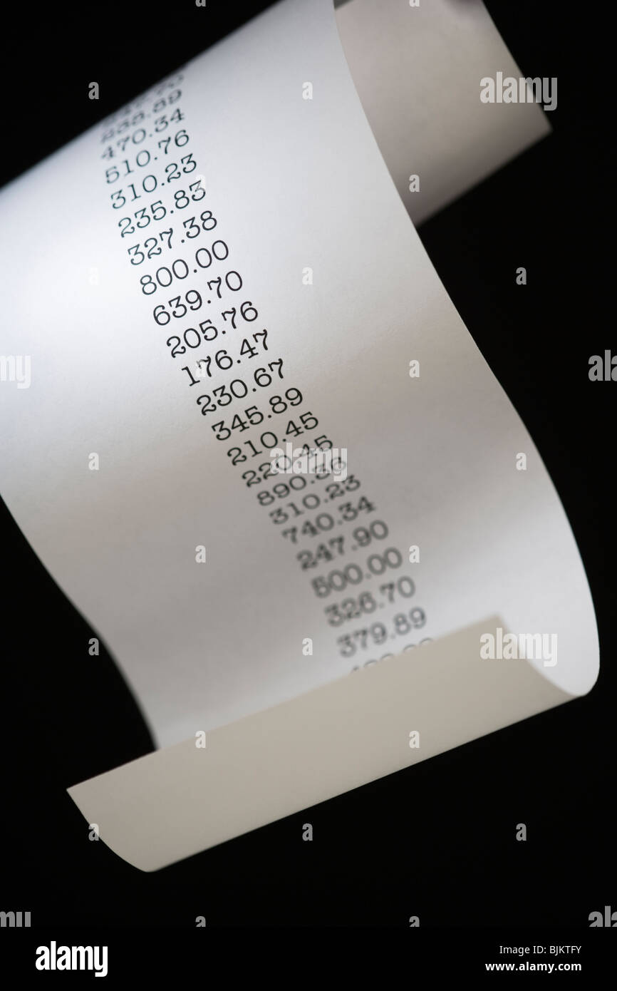 Adding machine tape closeup hi-res stock photography and images - Alamy