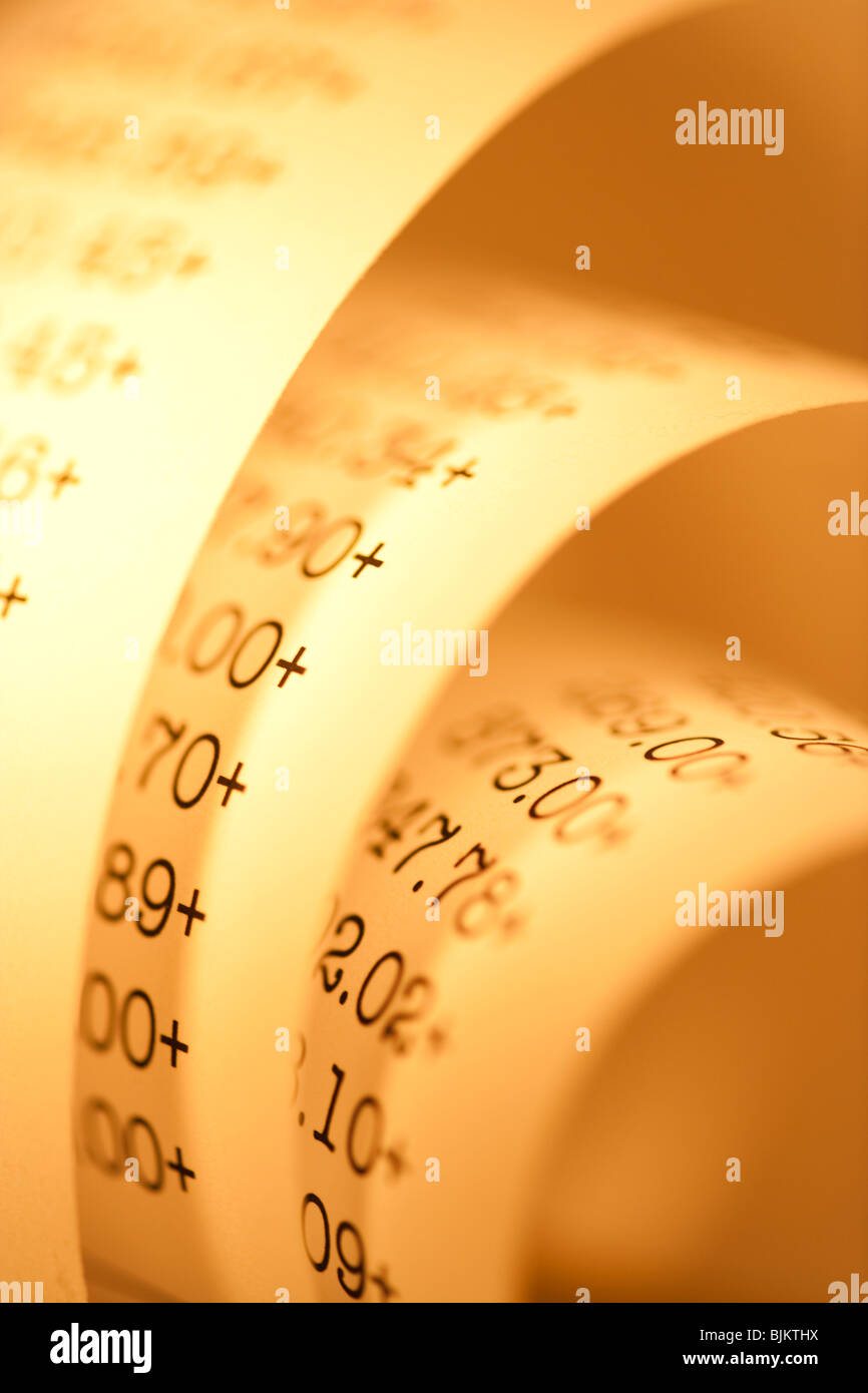 Adding machine tape closeup Stock Photo - Alamy
