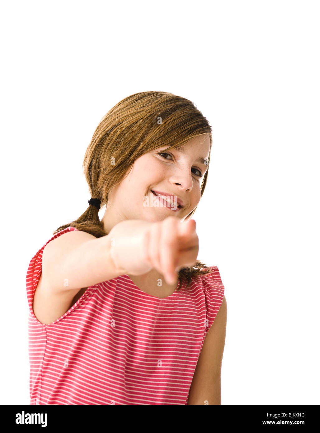 Girl with pigtails, pointing forward Stock Photo - Alamy
