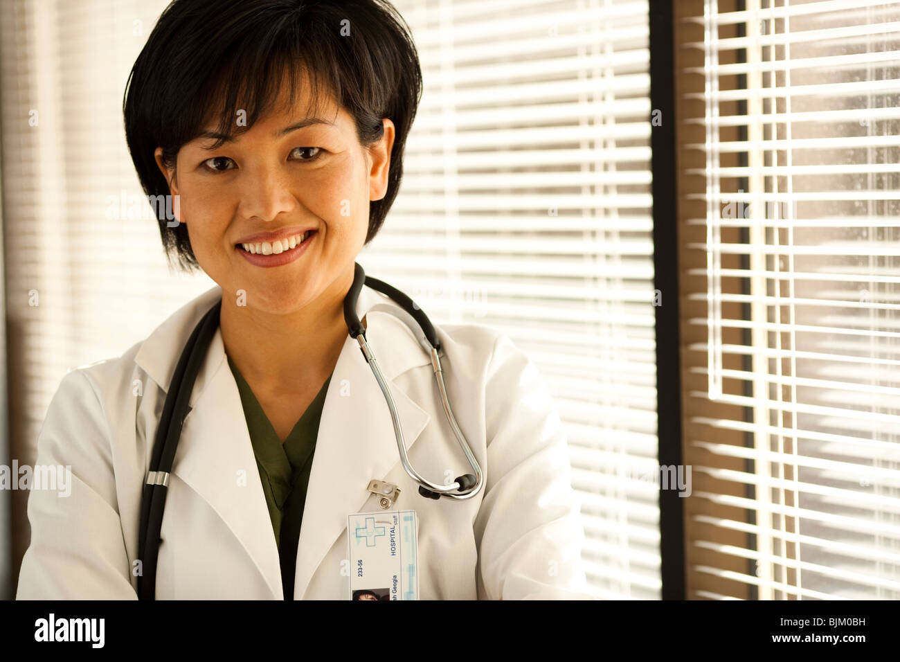 Female doctor name tag hi-res stock photography and images - Alamy