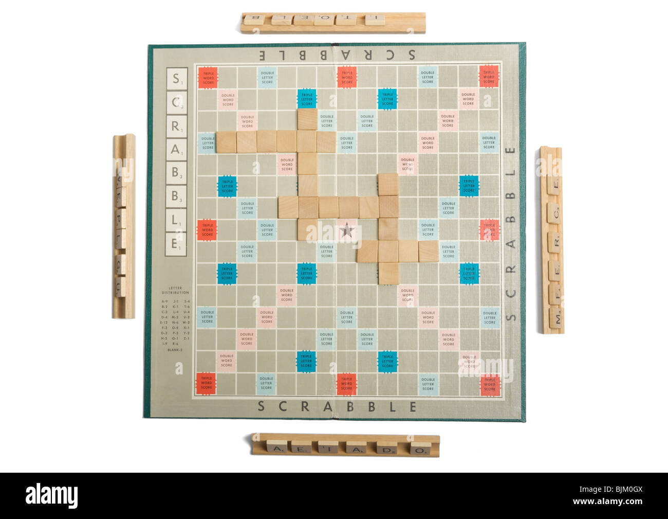 Scrabble board on white background Stock Photo - Alamy