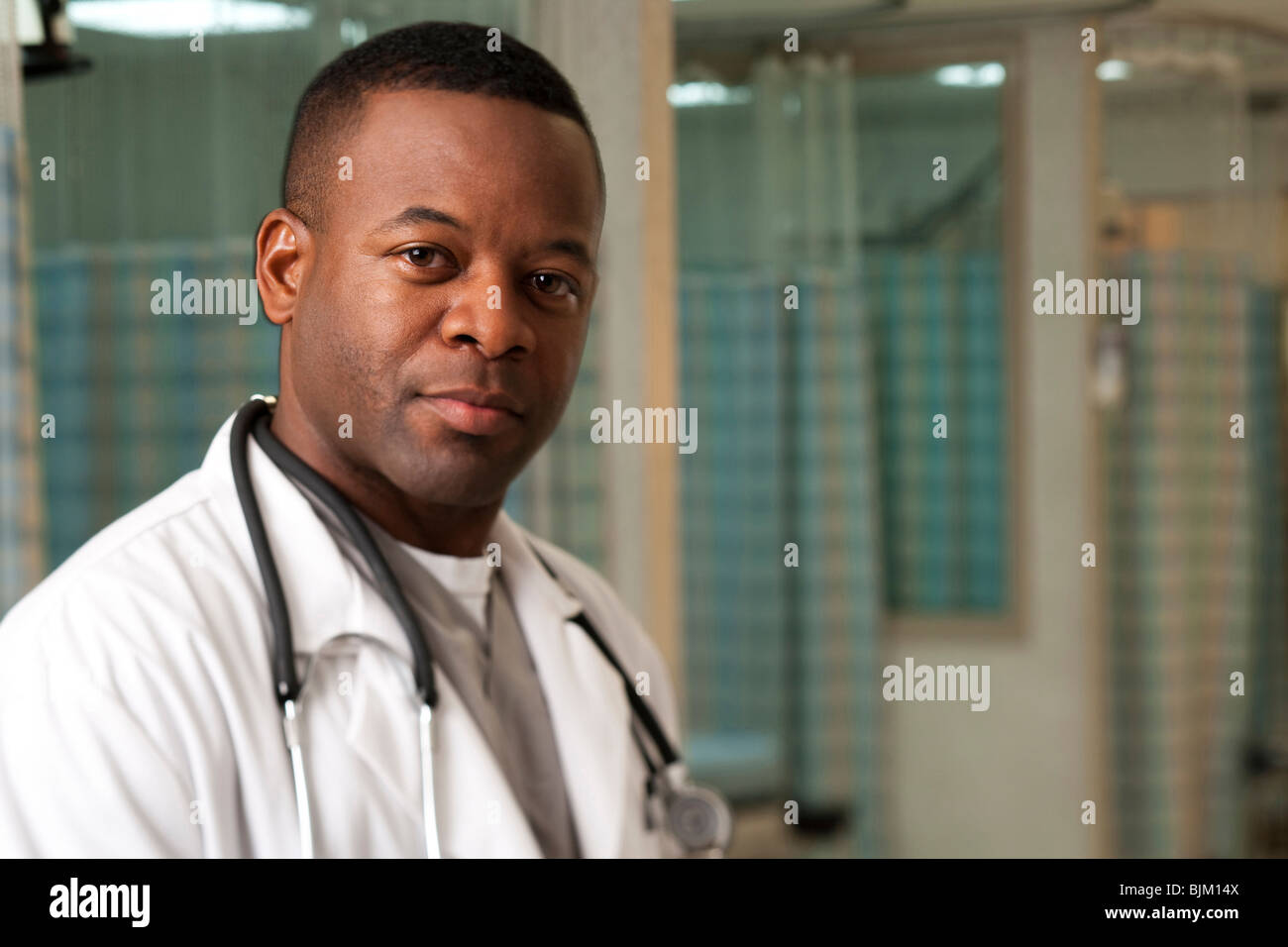 Male doctor posing Stock Photo - Alamy