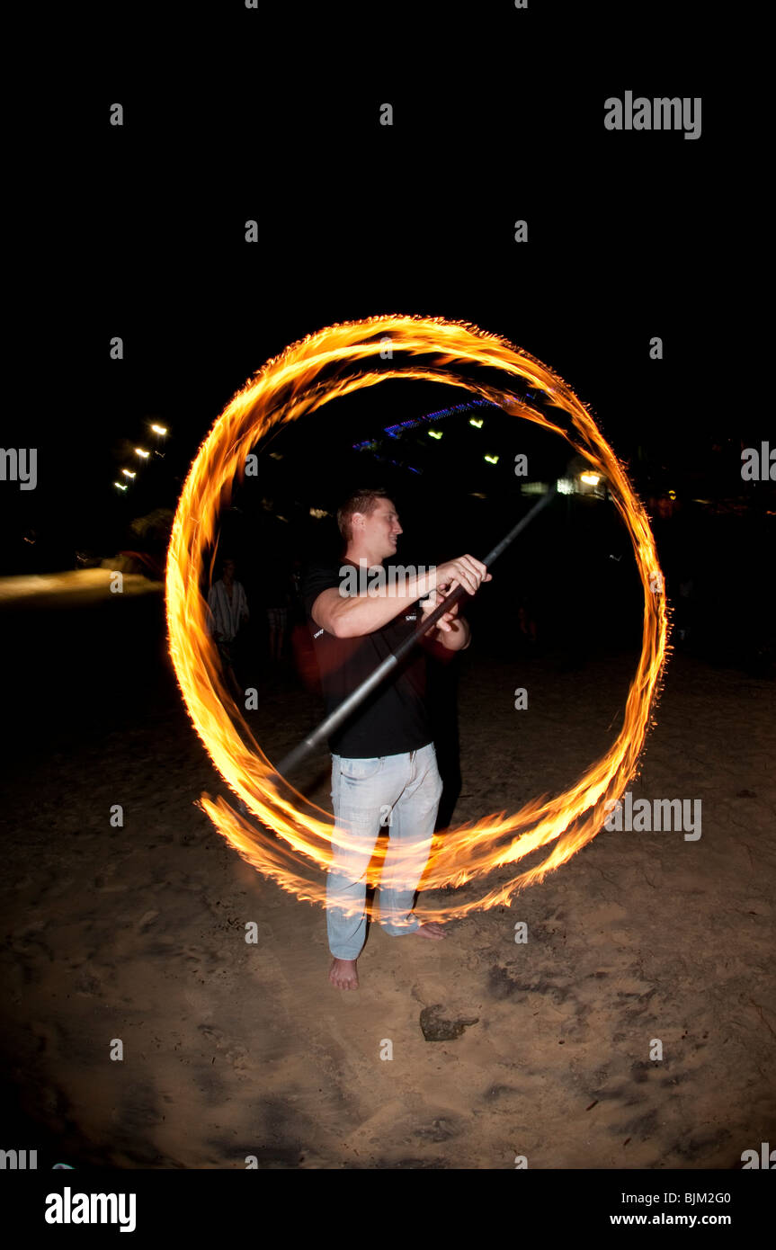 FIRE TWIRLING ON MOOLOOLABA BEACH Stock Photo - Alamy