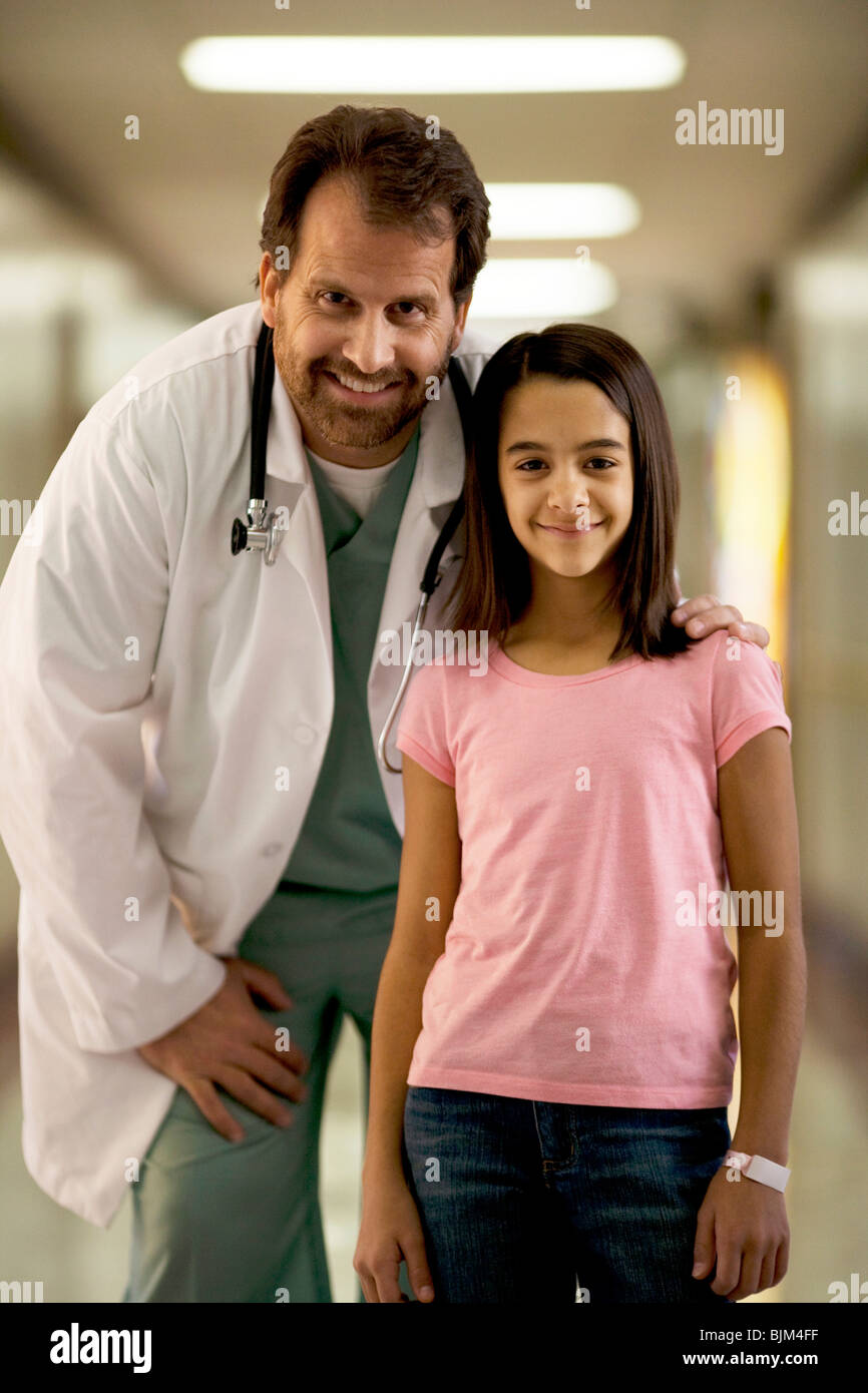 Portrait of a male doctor and girl Stock Photo - Alamy