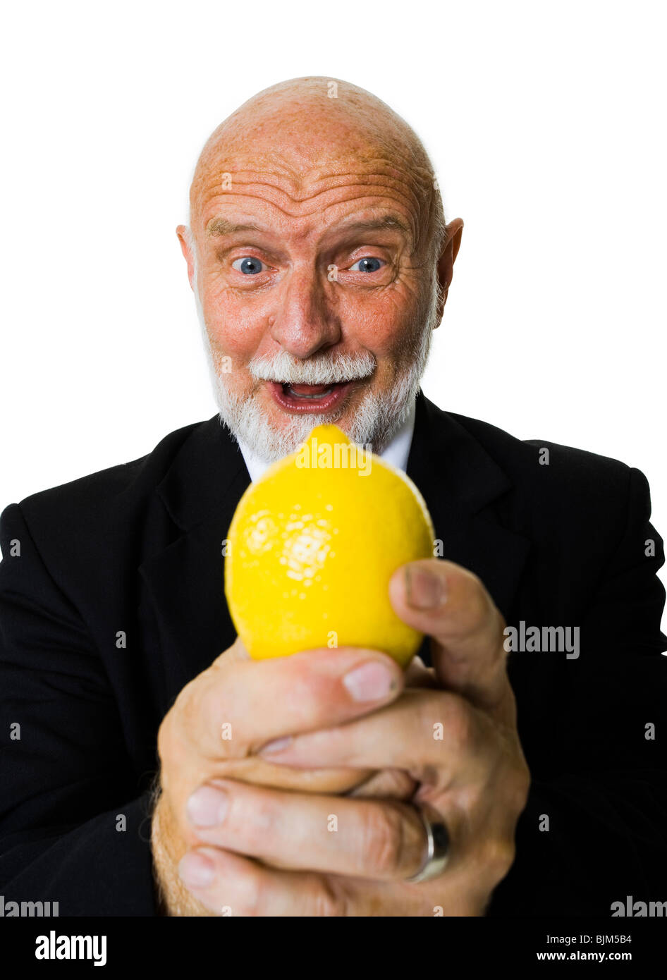 Mature businessman with lemon Stock Photo - Alamy