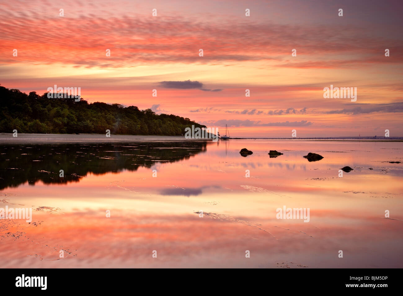 Sun setting over Priory Bay. Isle of Wight, England, UK Stock Photo - Alamy