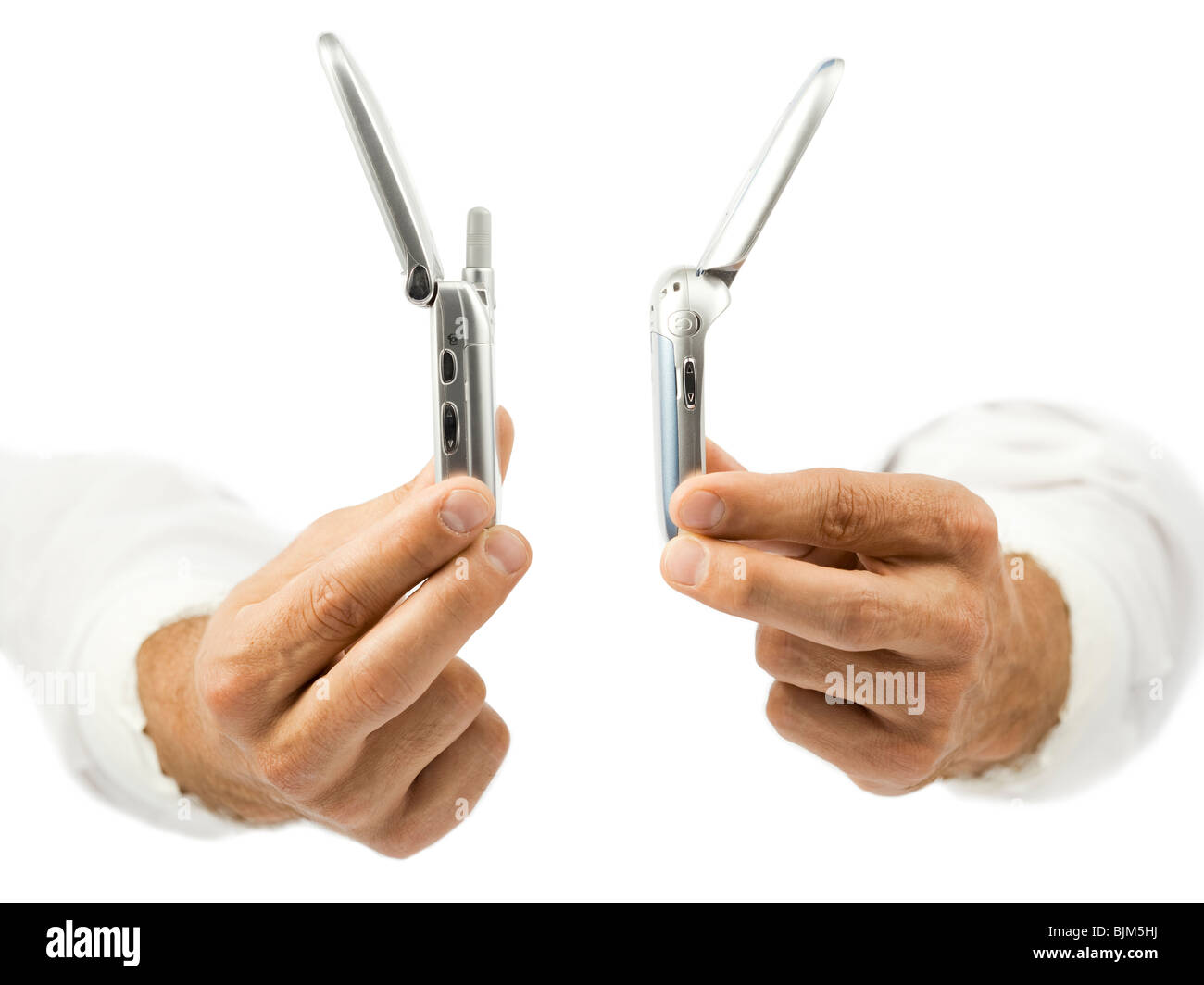 Hand with cell phones Stock Photo - Alamy